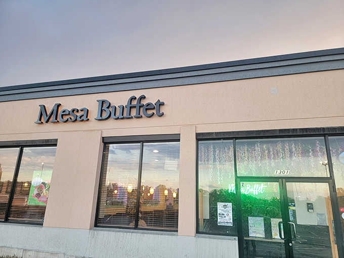 Evening light catches the Mesa Buffet sign just right, making it glow like a beacon for international food lovers.