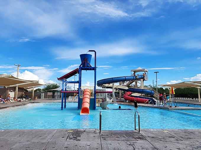 Those colorful slides and splash towers prove community pools can rival the fancy resorts any day.