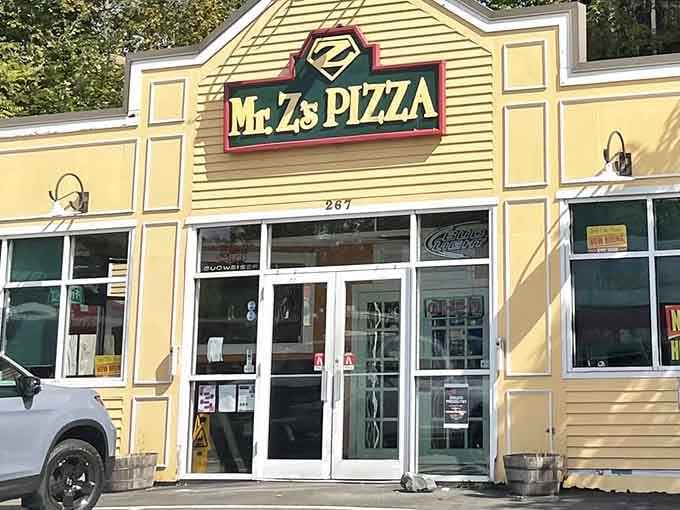 That superhero-style logo promises pizza powers that could save even the most disappointing takeout night.