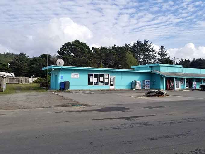 This turquoise building stands out like a mint candy against the coastal gray, and we're here for it.