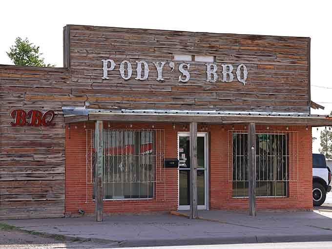Weathered wood and sun-bleached paint tell you this barbecue joint has earned its stripes the hard way.