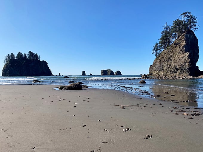 Those sea stacks rise like ancient sentinels guarding the sandy beach&mdash;nature's own sculpture garden here.
