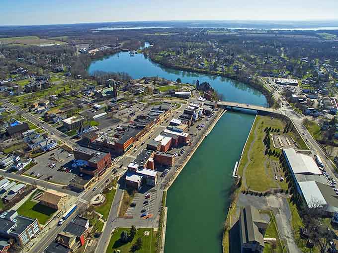 The canal cuts through town like a liquid highway, connecting past industrial glory to present-day waterfront charm and beauty.