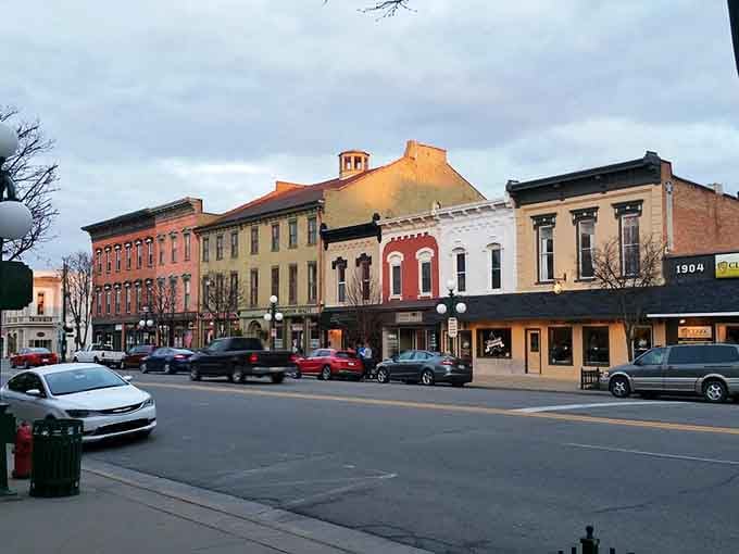 Tecumseh's historic storefronts catch the evening light, their varied colors telling stories of generations past and present.