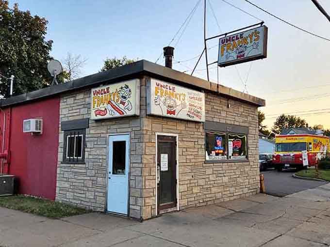 This cozy corner building with its cheerful signage looks like it jumped straight out of a 1950s neighborhood postcard.