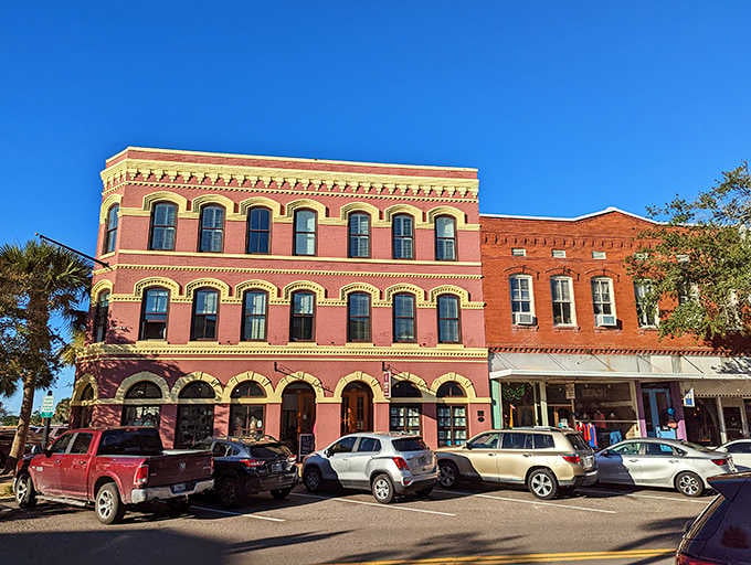 Historic brick architecture with arched windows stands proud, reminding us that some buildings just get better with age.