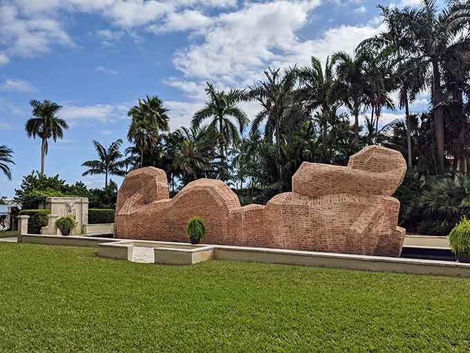 Peacocks and sculptures share this tropical paradise where art meets nature in spectacular South Florida style.