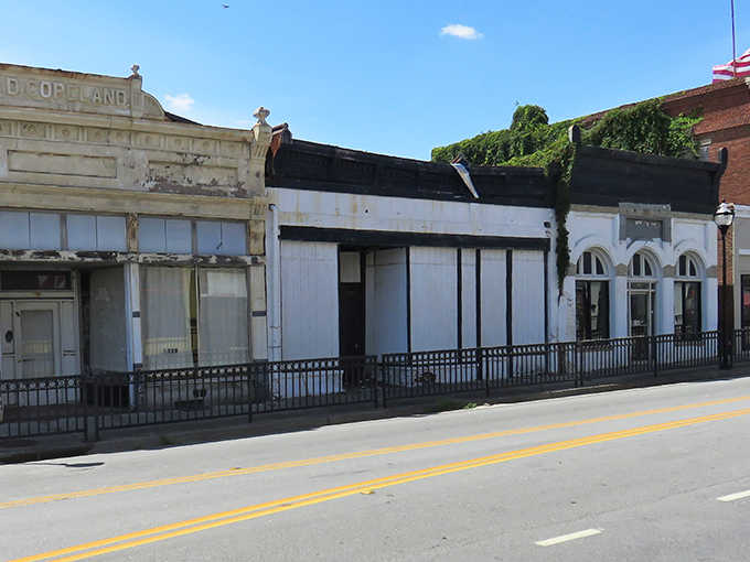 Historic buildings wear their age gracefully along streets where your Social Security check covers everything you truly need.