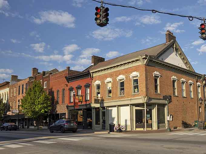 Historic brick buildings wear their age like badges of honor, each facade telling stories of generations who built something meant to last.
