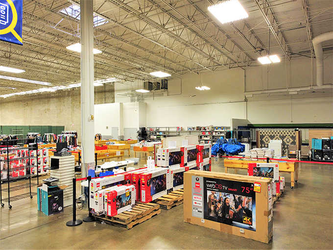 High warehouse ceilings and pallet displays create an honest, no-frills approach where savings come first, always.