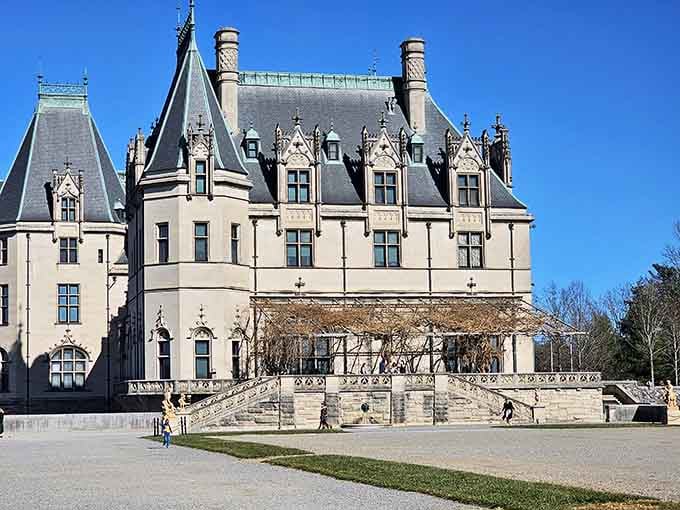 Every turret and tower whispers stories of Gilded Age grandeur against the Blue Ridge mountain backdrop.