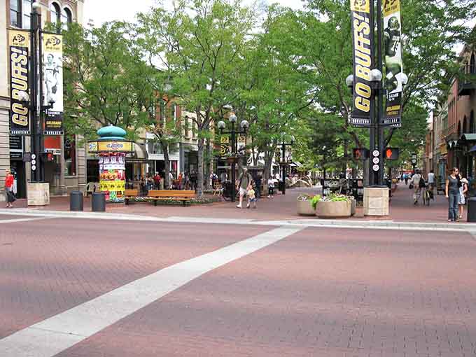 This pedestrian mall buzzes with life under trees that frame the distant mountain views beautifully.