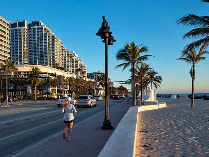 Golden hour transforms this beachfront promenade into pure magic, with palm trees swaying and the ocean sparkling like diamonds.