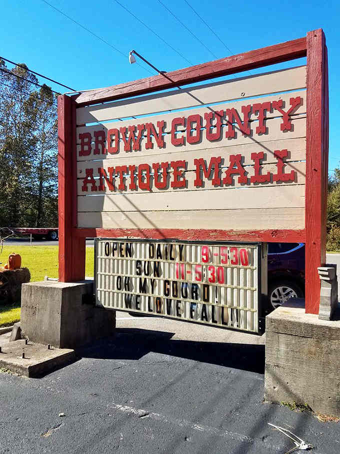 The old-fashioned marquee board spells out hours like drive-in theaters used to announce double features.