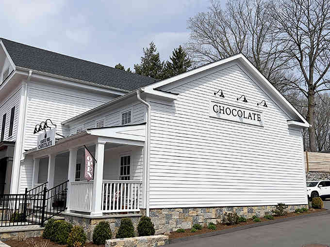 White clapboard siding and a cozy porch make this chocolate shop feel like visiting your favorite aunt's house—if she made amazing truffles.