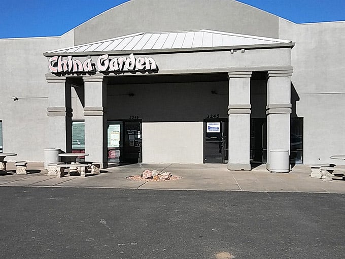 Stone picnic tables outside hint at casual dining where good food matters more than fancy surroundings.