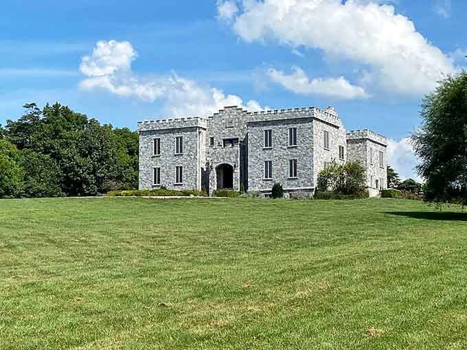 Stone walls and crenellated towers create an authentic fortress rising from perfectly manicured Indiana countryside.