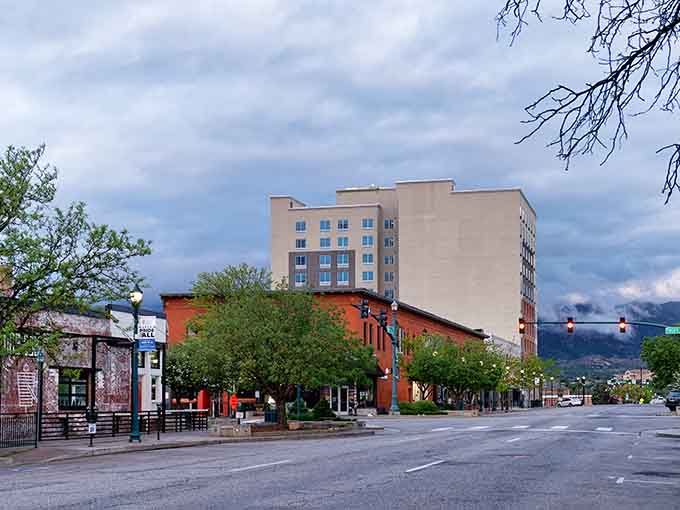 Mountain views peek between downtown buildings in this city where wilderness and civilization shake hands daily.