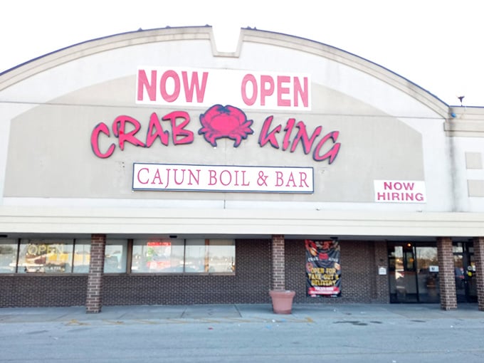 The welcoming "NOW OPEN" declaration means your next seafood boil adventure is just a parking spot away.