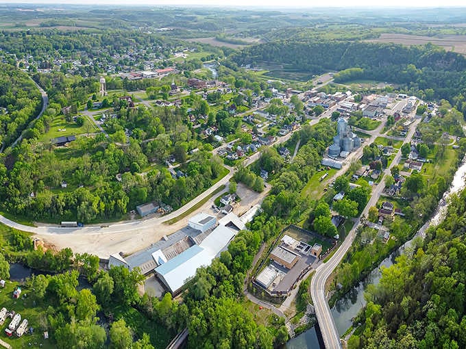 Green hills embrace this valley town from every angle, creating a natural amphitheater of beauty and tranquility.