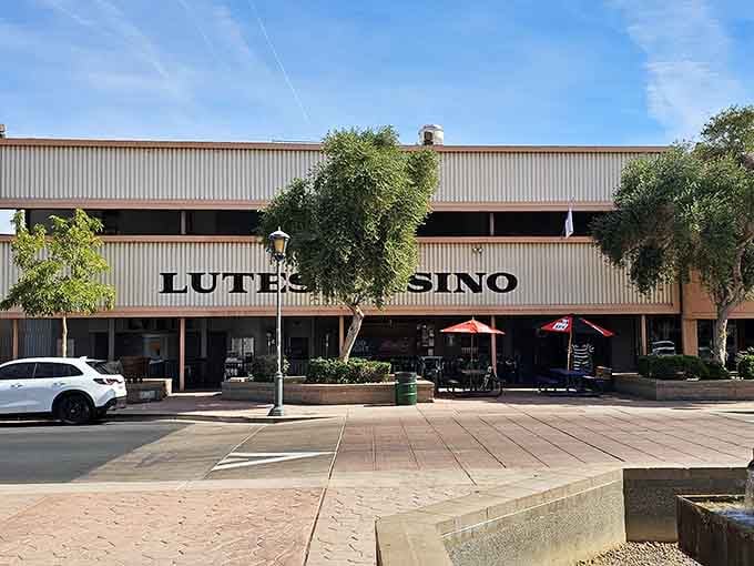 Mature trees provide natural shade for a building that's been feeding locals since your parents were young.
