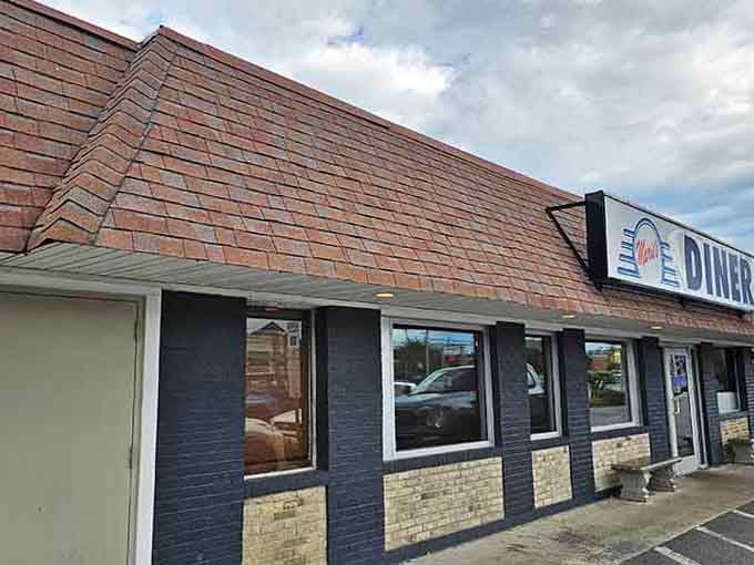 That classic brick exterior and simple signage prove the best diners don't need fancy architecture to serve outstanding breakfast.