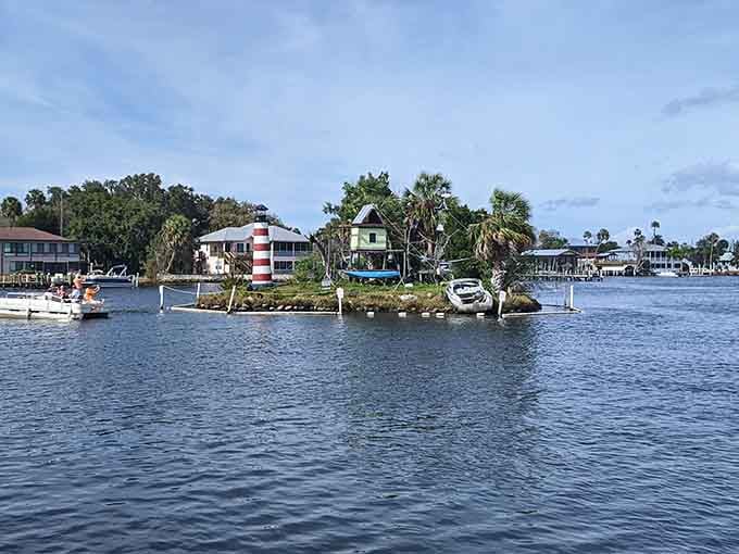 Palm trees frame this unusual floating neighborhood where monkeys reign supreme over their own little kingdom.