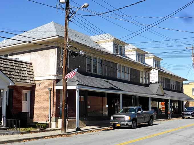 That corner building adds personality to this quiet street scene worth exploring slowly.