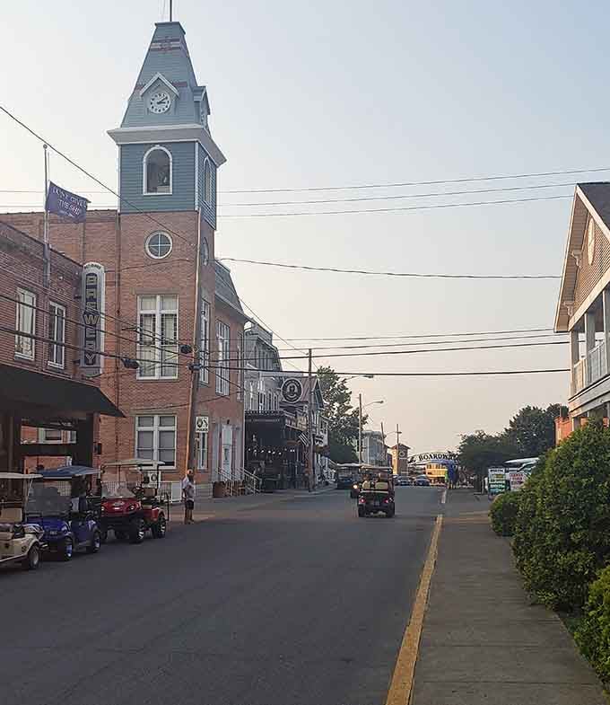 That distinctive clock tower rises above the street like a lighthouse guiding visitors to small-town paradise below.