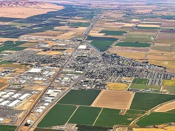 From above, the patchwork of green and gold fields looks like nature's own quilt, stitched together by hardworking farmers.