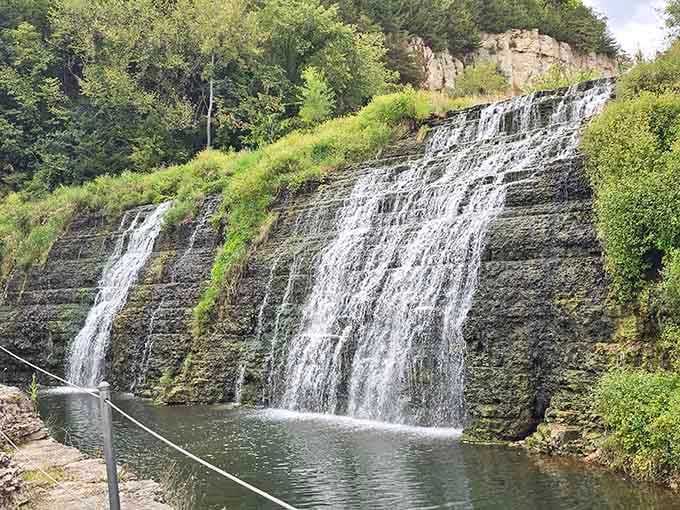Those striped rock layers tell millions of years of geological history while the waterfall steals the show today.