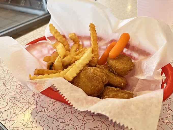 Kids' meals come with entertainment included: watching your chicken nuggets arrive by locomotive beats any tablet game.