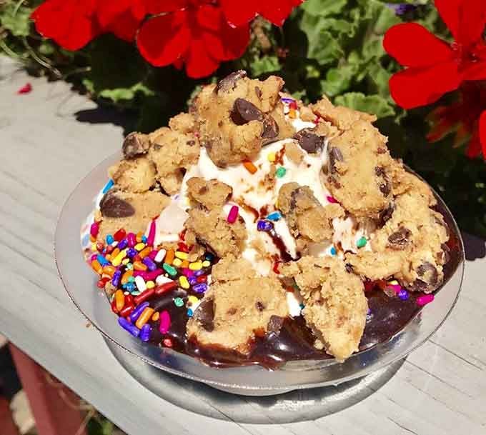 Cookie dough chunks, sprinkles, and hot fudge create a sundae so elaborate it deserves its own architectural award and Instagram account.