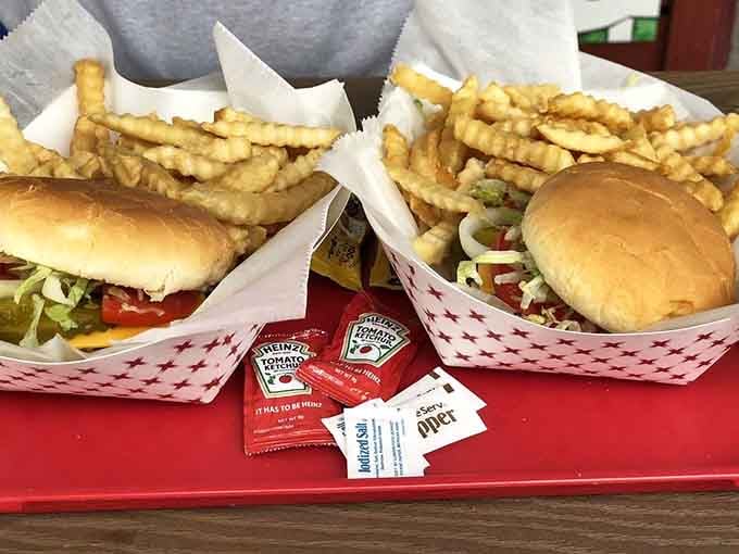 Two cheeseburgers with all the fixings and a mountain of fries, because sometimes more really is more.