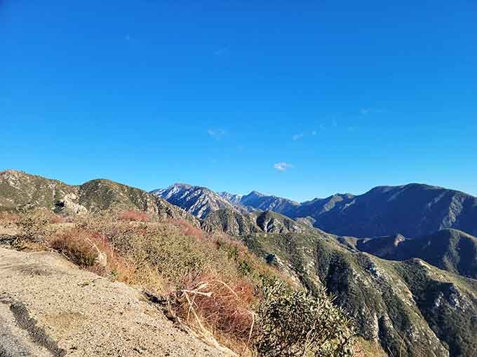 Autumn colors paint the mountainsides in russet tones, creating a masterpiece that changes with every season.