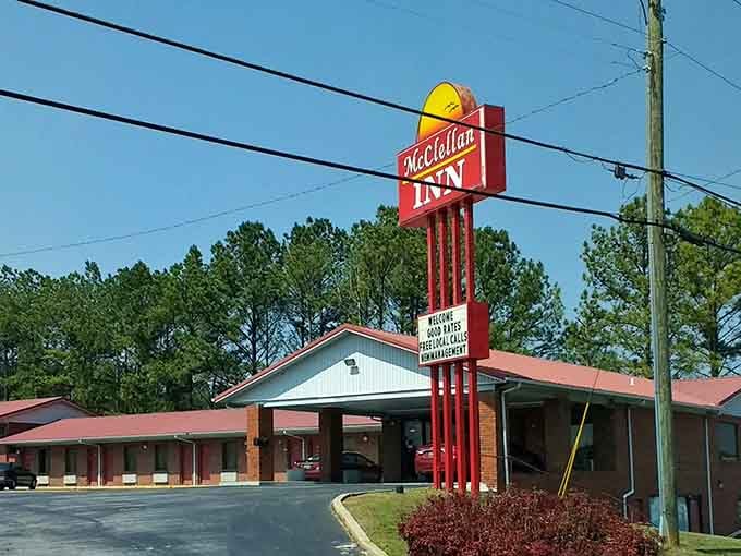 That classic roadside sign is a beacon of affordable hospitality in a world of overpriced boutique hotels.