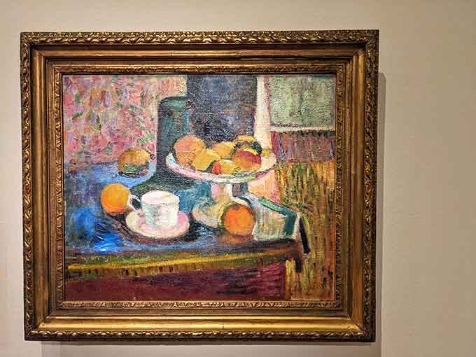 This still life practically glows with Matisse's signature color intensity that makes ordinary fruit look extraordinary.