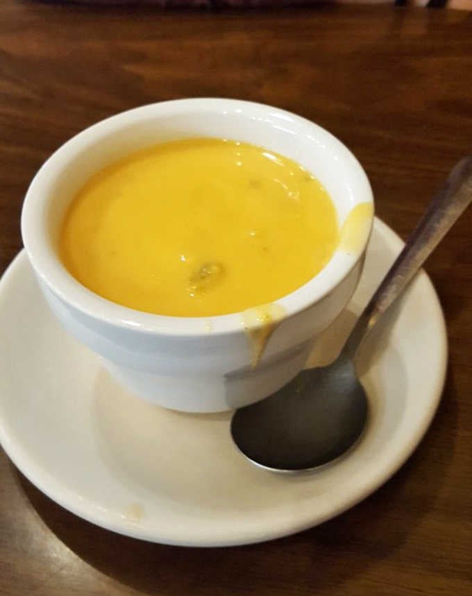 That golden cheese soup is liquid comfort in a bowl, the kind that warms you from the inside out.