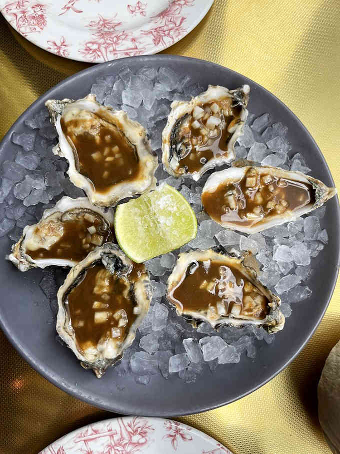 Fresh oysters on ice: nature's way of reminding you that sometimes the best things in life come in rough packages.