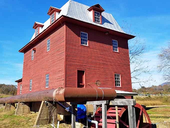 This red mill stands as proof that some things are too beautiful to tear down and replace.