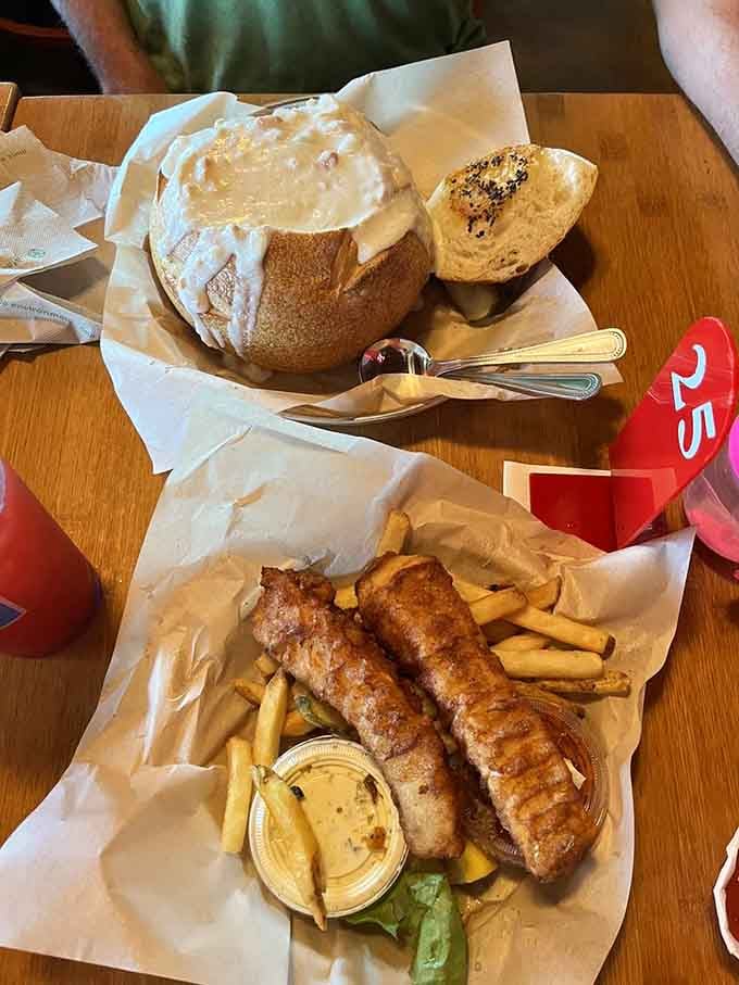 This spread of chowder and fish proves that sometimes heaven is just fried seafood and carbs working in perfect harmony.