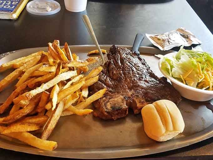 Those perfect grill marks on that porterhouse tell you someone back there really knows their way around fire.