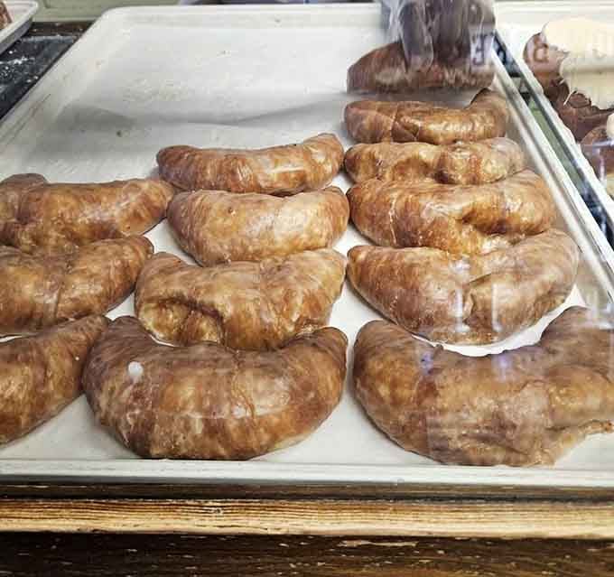 Golden croissants that flake apart like buttery snowdrifts, proving French technique works beautifully in Minnesota hands.
