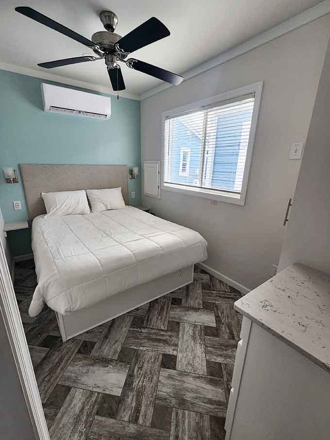 The master bedroom offers comfort and water views, turning bedtime into a nightly waterfront experience.