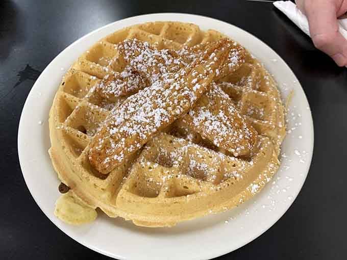 Chicken tenders meeting a Belgian waffle is the kind of unlikely friendship that just works beautifully.