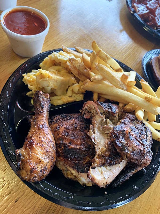 Golden-skinned smoked chicken with fries and mac proves poultry deserves respect in barbecue country too.