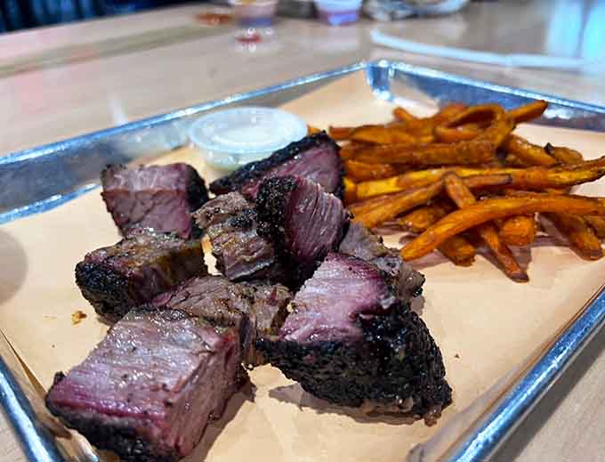 Burnt ends with sweet potato fries prove that sometimes the best combinations are the ones you didn't plan.