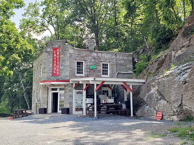 Tucked against the hillside like a secret hideaway, this stone building has been greeting curious explorers for longer than most of us remember.