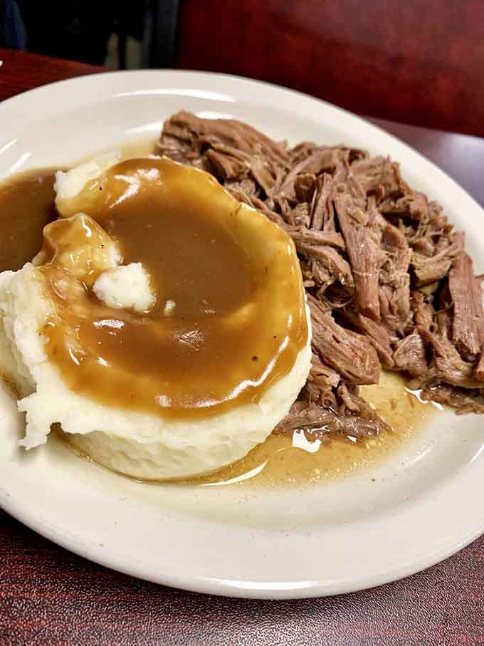 Tender roast beef with gravy-smothered mashed potatoes: comfort food that actually lives up to its name.