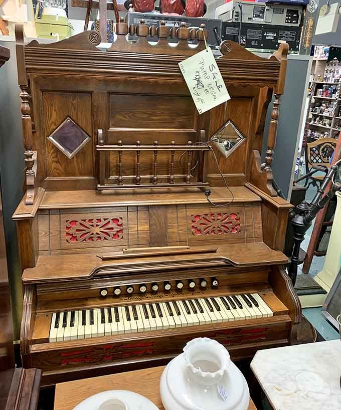 This ornate pump organ once filled parlors with music, back when entertainment meant gathering around and making your own magic.
